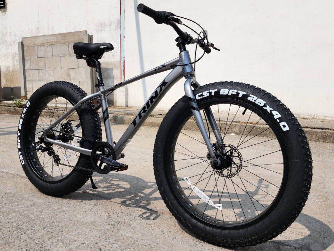 TRINX T106(ส่งฟรีทั่วไทย ผ่อน0%🎁) จักรยานล้อโต 26x4 นิ้ว เกียร์ SHIMANO ...