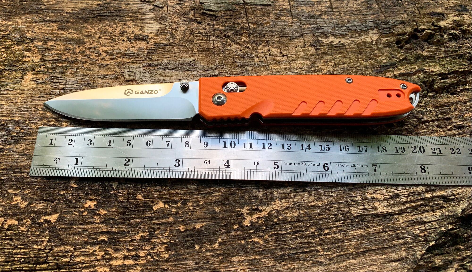 Ganzoรุ่นG746-1-OR ของแท้ ใบมีดยาว 8.2 ซม เหล็ก 440C, ความแข็งเหล็ก 58HRC วัสดุด้าม G10 มีระบบ ...