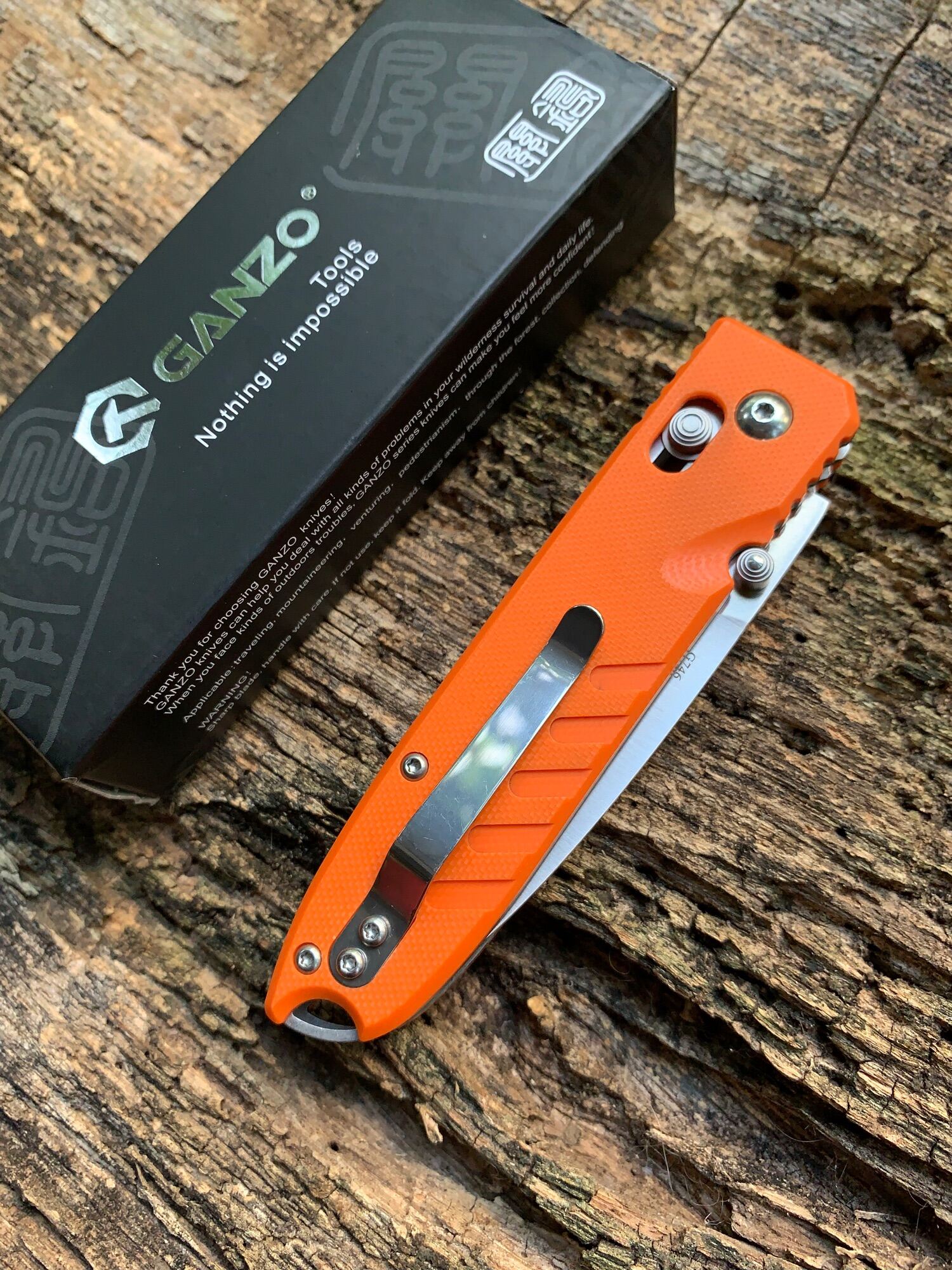 Ganzoรุ่นG746-1-OR ของแท้ ใบมีดยาว 8.2 ซม เหล็ก 440C, ความแข็งเหล็ก 58HRC วัสดุด้าม G10 มีระบบ ...