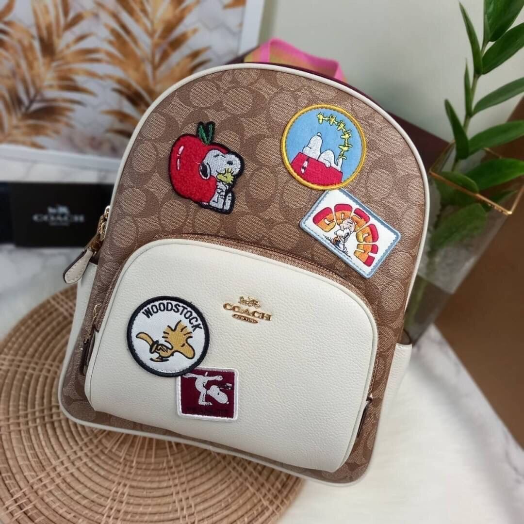 COACH X PEANUTS COURT BACKPACK IN SIGNATURE CANVAS WITH VARSITY PATCHES ...