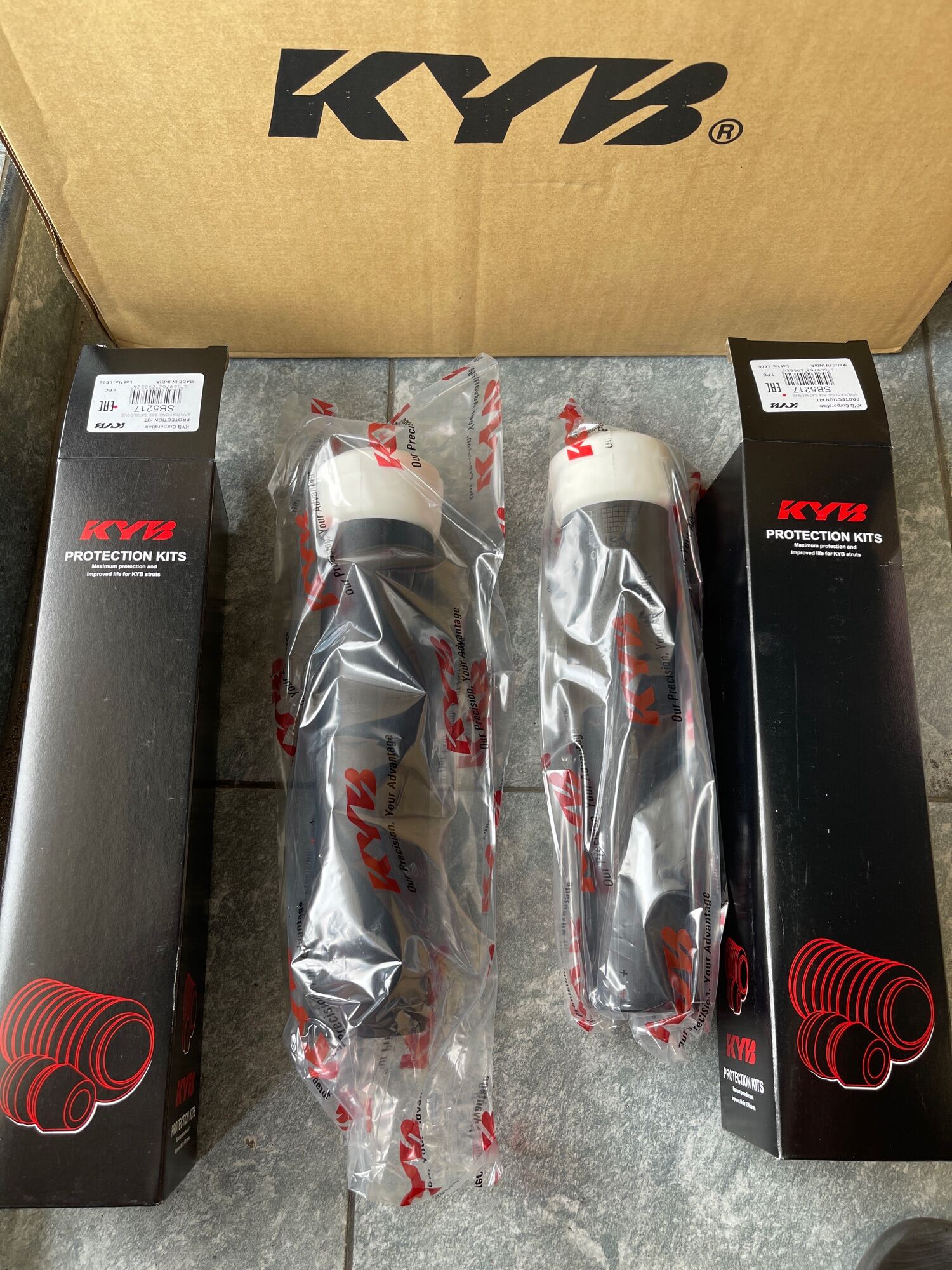 KYB กันฝุ่น+ กันกระแทก โช้คอัพหลัง Mazda 2 DJ Skyactive / Mazda CX-3 [1 คู่ ] ซ้าย-ขวา SB5217 ...